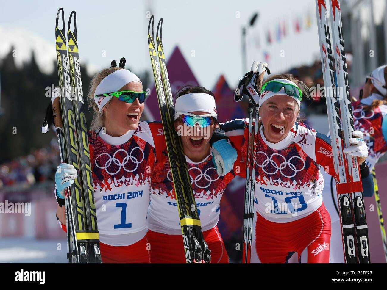 Norway's Marit Bjoergen (centre) celebrates winning the Ladies 30km ...