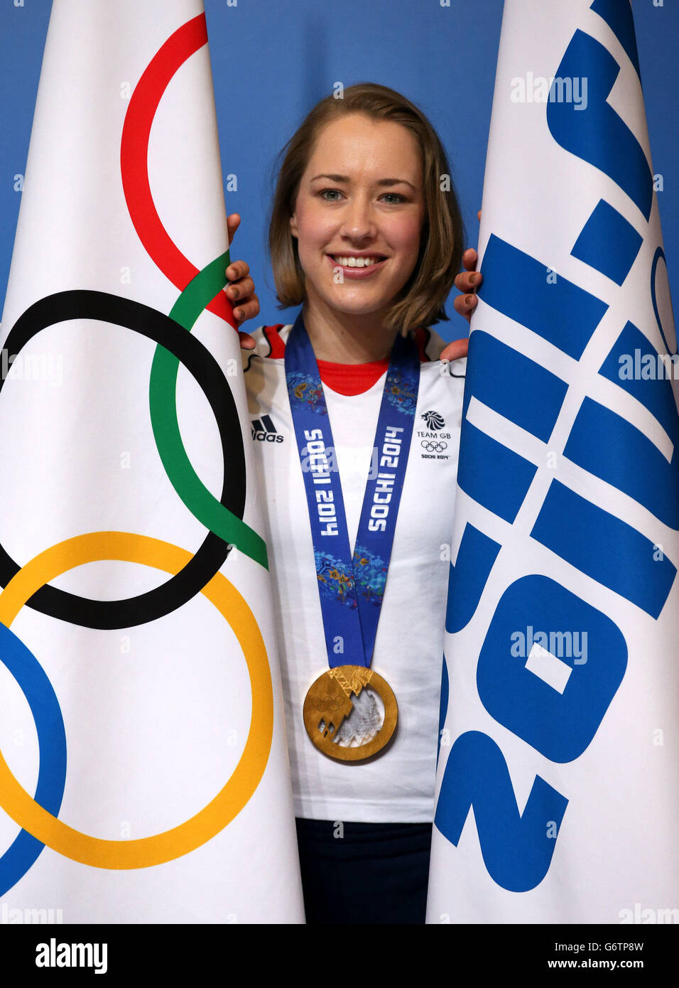 Great Britain's Lizzy Yarnold beside an Olympic flag after a press ...