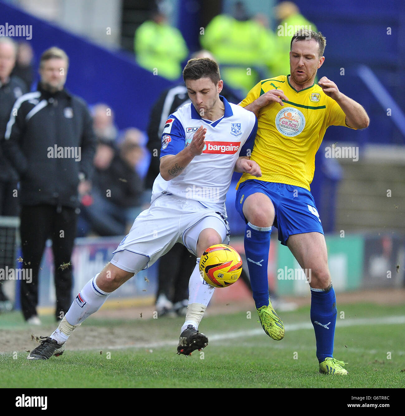 Coventry City's Andy Webster battles with Tranmere Rovers' Jake Cassidy ...