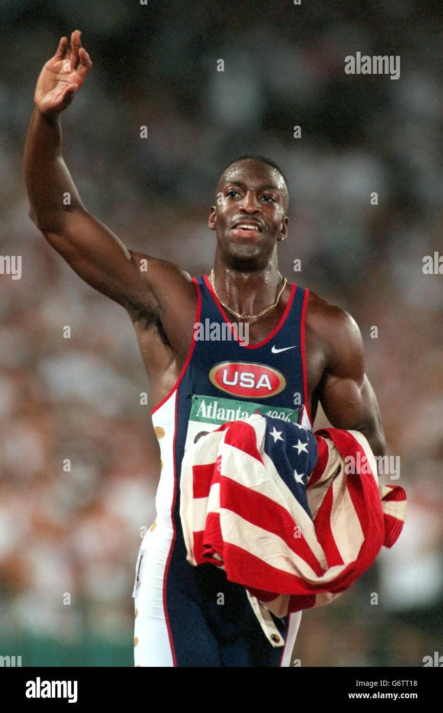 Usas michael johnson celebrates his 400m win hi-res stock photography ...