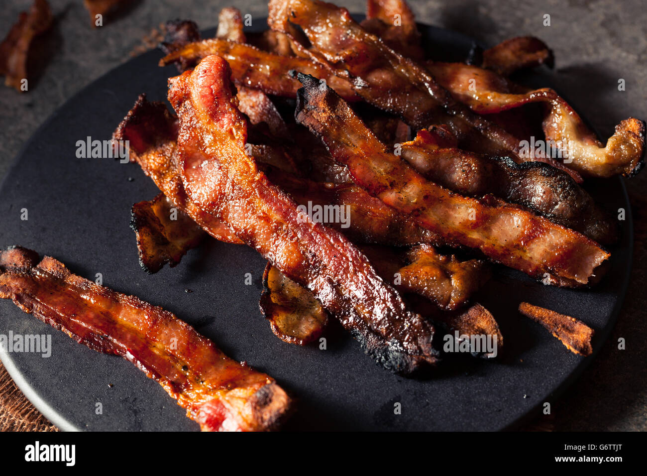Greasy Hot Grilled Bacon Ready to Eat Stock Photo - Alamy