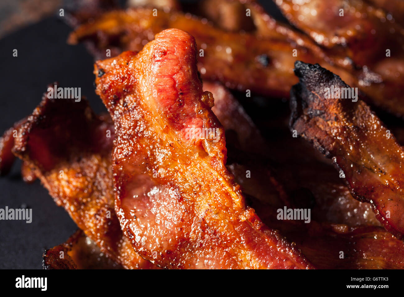 Greasy Hot Grilled Bacon Ready to Eat Stock Photo - Alamy