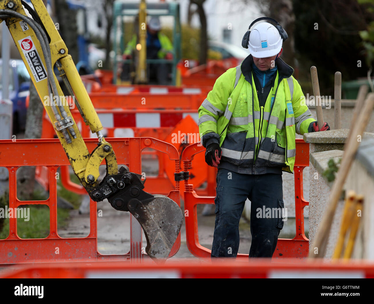 A GMC|Sierra worker during water meter installations in Glasnevin ...