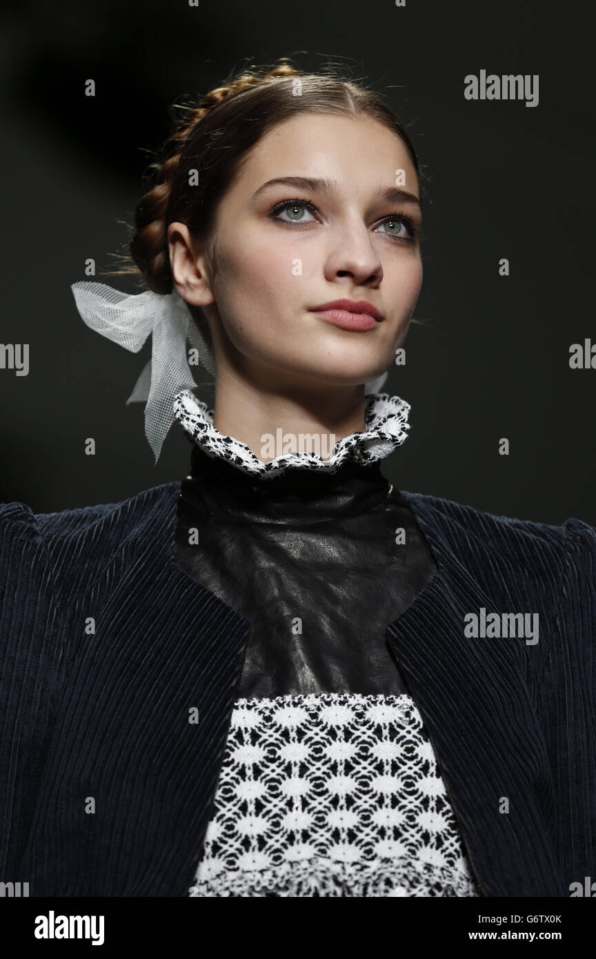 A model appears on the catwalk during the Autumn Winter 2014 Bora Aksu ...