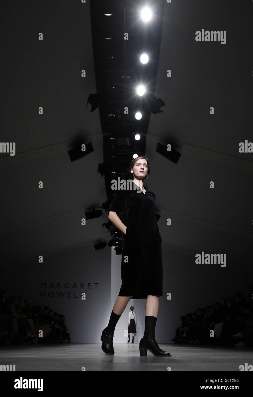 A model appears on the catwalk during the Margaret Howell Autumn/Winter ...