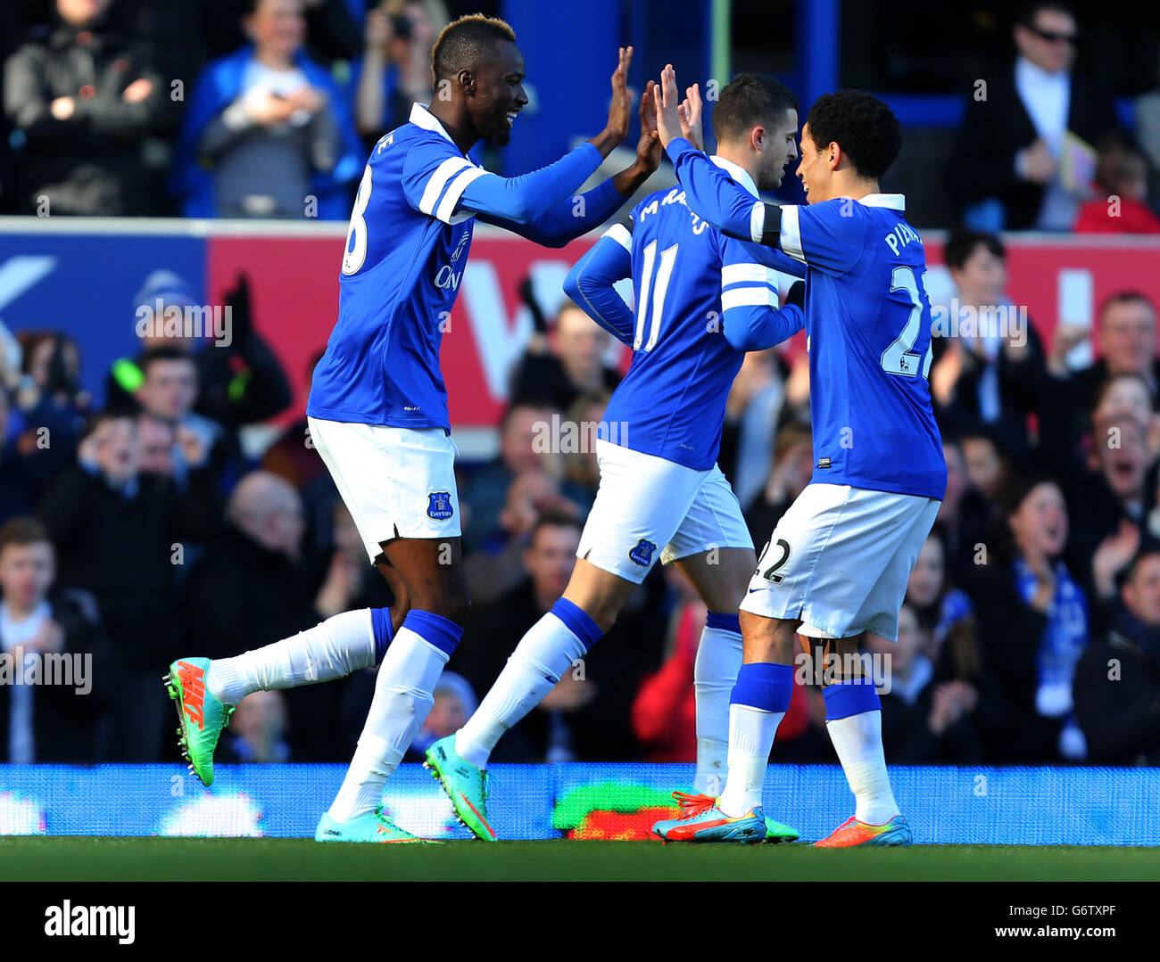Everton's Lacina Traore celebrates his goal with Everton's Steven ...