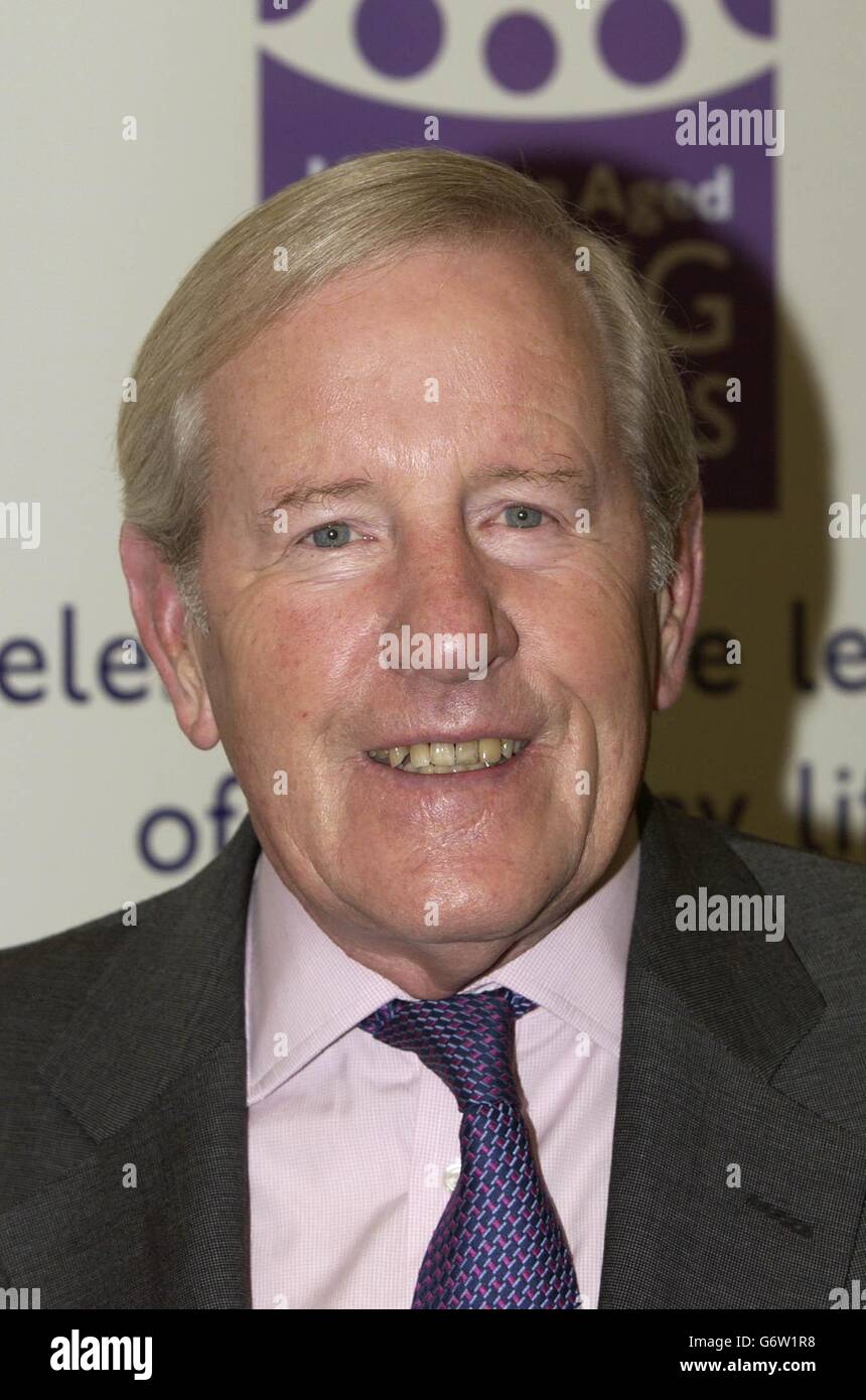 Neil Durden Smith poses for photographers during the Help The Aged ...