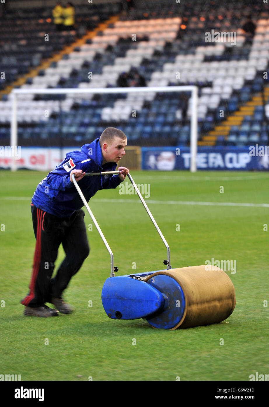 General view of Rochdale's Spotland Stadium as ground staff roll the ...