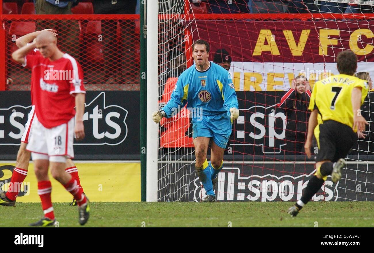 Aston Villa goalkeeper Thomas Sorenson (centre) celebrates the missed ...