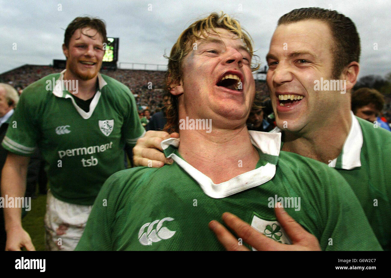 Ireland's captain Brian O'Driscoll (centre) is embraced by team-mate ...
