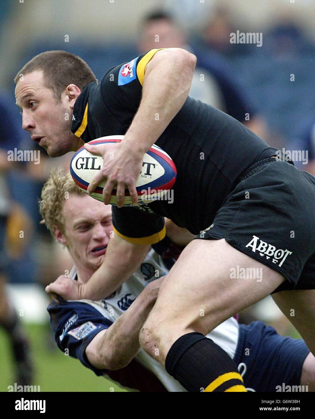 Wasps Mark Denney ploughs through an attempted tackle by Rotherham ...