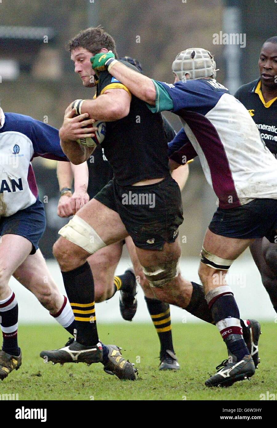Wasps' Simon Shaw (left) is challenged by Rotherham's Brad Macleod ...