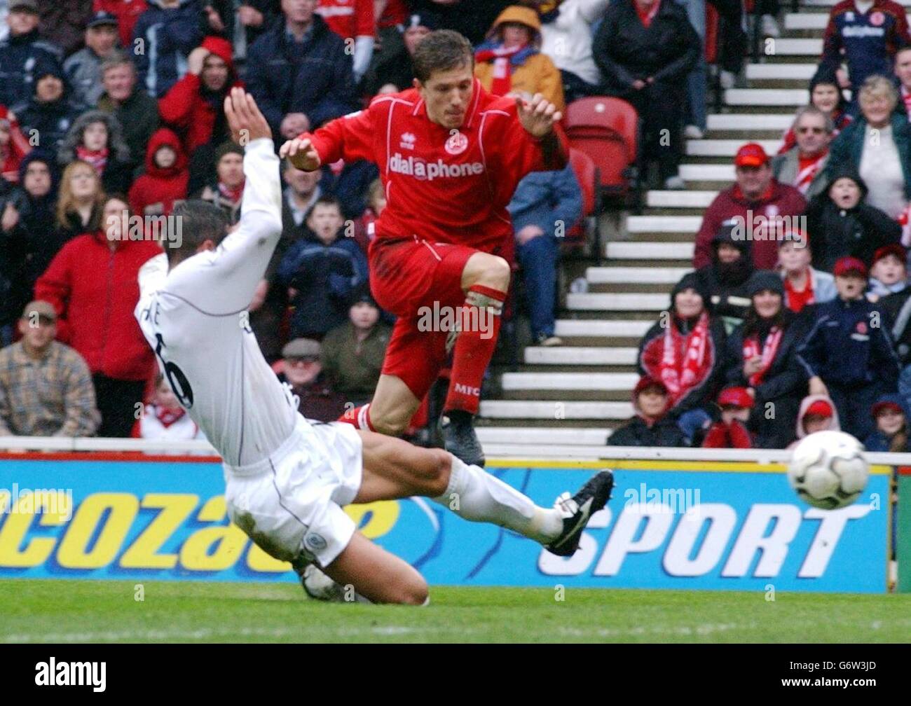 Middlesbrough's Juninho (right) in action with Emerson Thome of Bolton ...