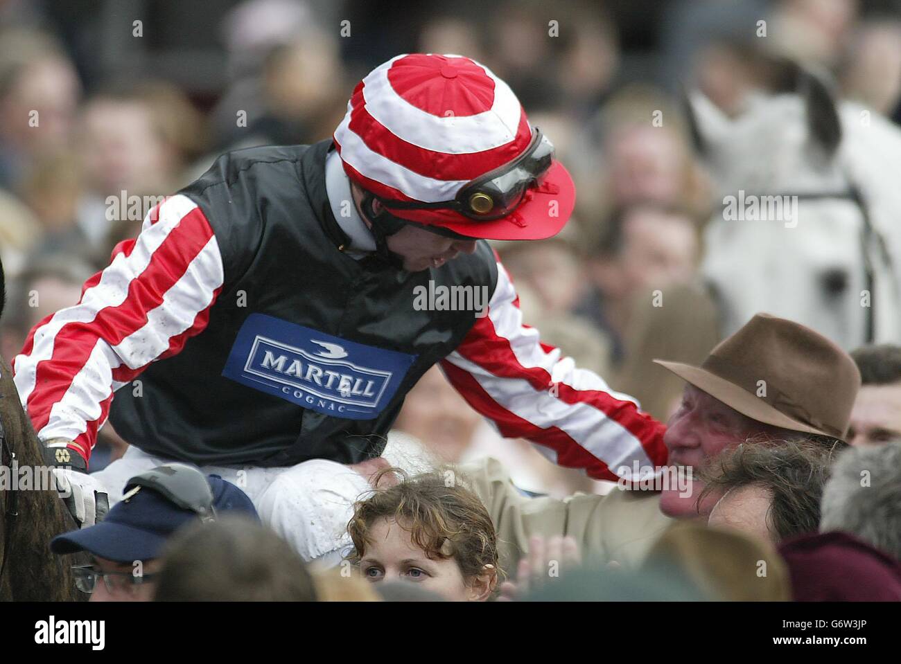 Graham Lee on Amberleigh house is congratulated by trainer Ginger ...