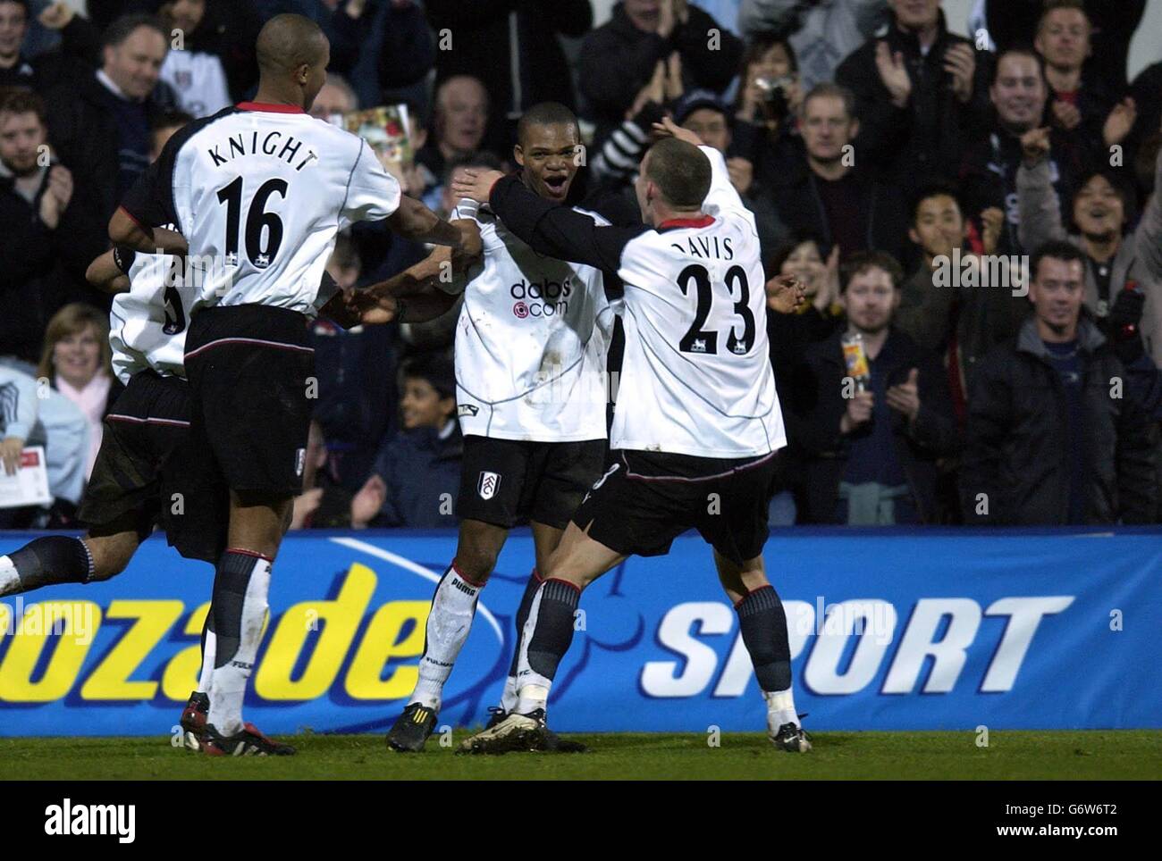 Fulham's Collins John (centre) celebrates his side's second goal ...