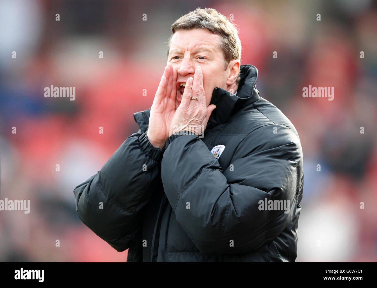 Barnsley Manager Danny Wilson shouts his orders from the side line ...