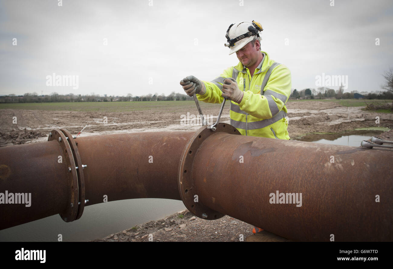 A worker starts work on dismantling pipe work for the Dutch pumps on ...