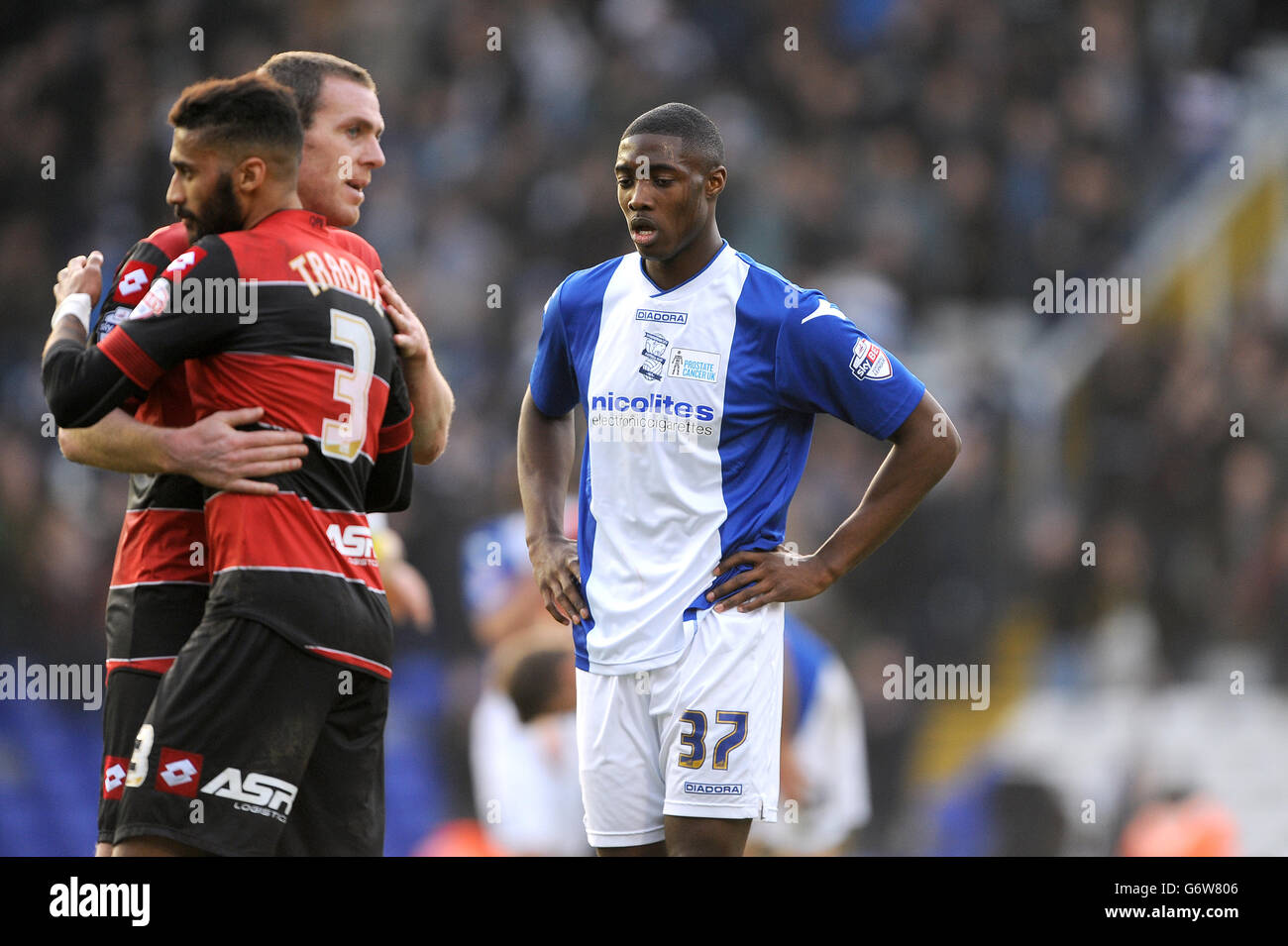 Queens Park Rangers' Richard Dunne and Armand Traore (second left ...