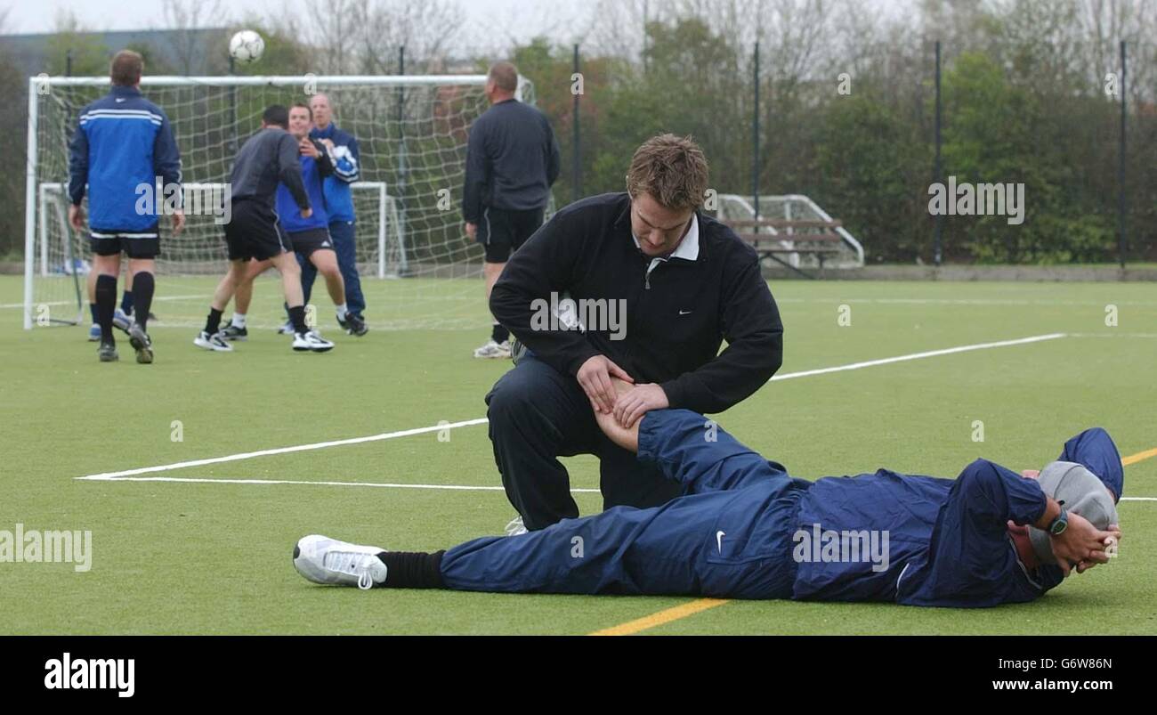 FA Select Group of Premiership referees (L-R),Jeff Winter receives ...