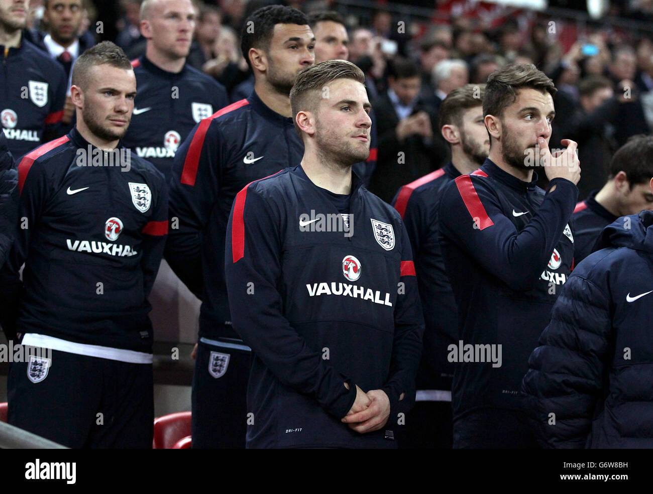(L-R) England's Tom Cleverley, Luke Shaw and Jay Rodriguez on the bench ...