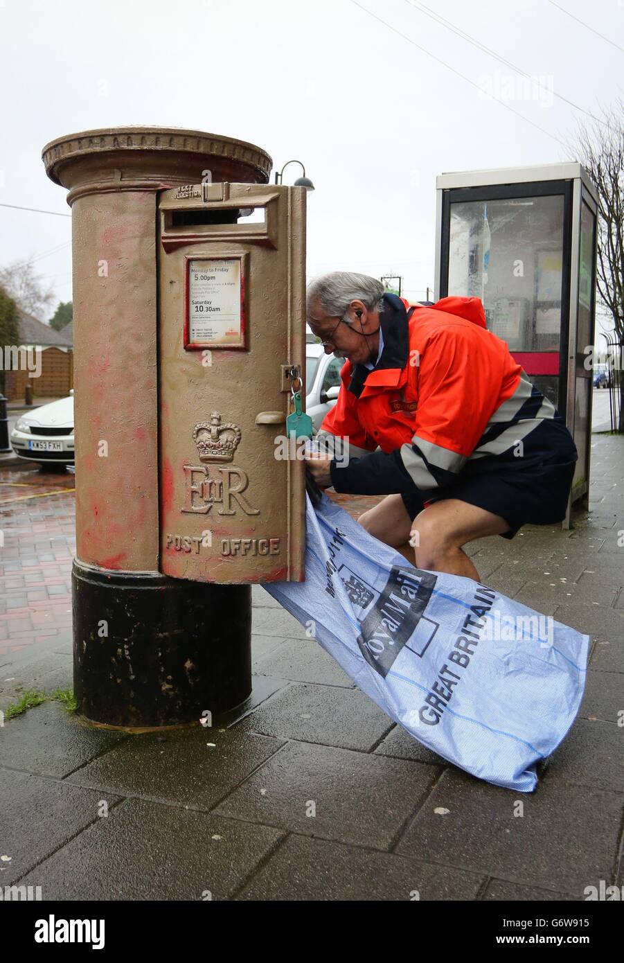 Postbox postman hi-res stock photography and images - Alamy