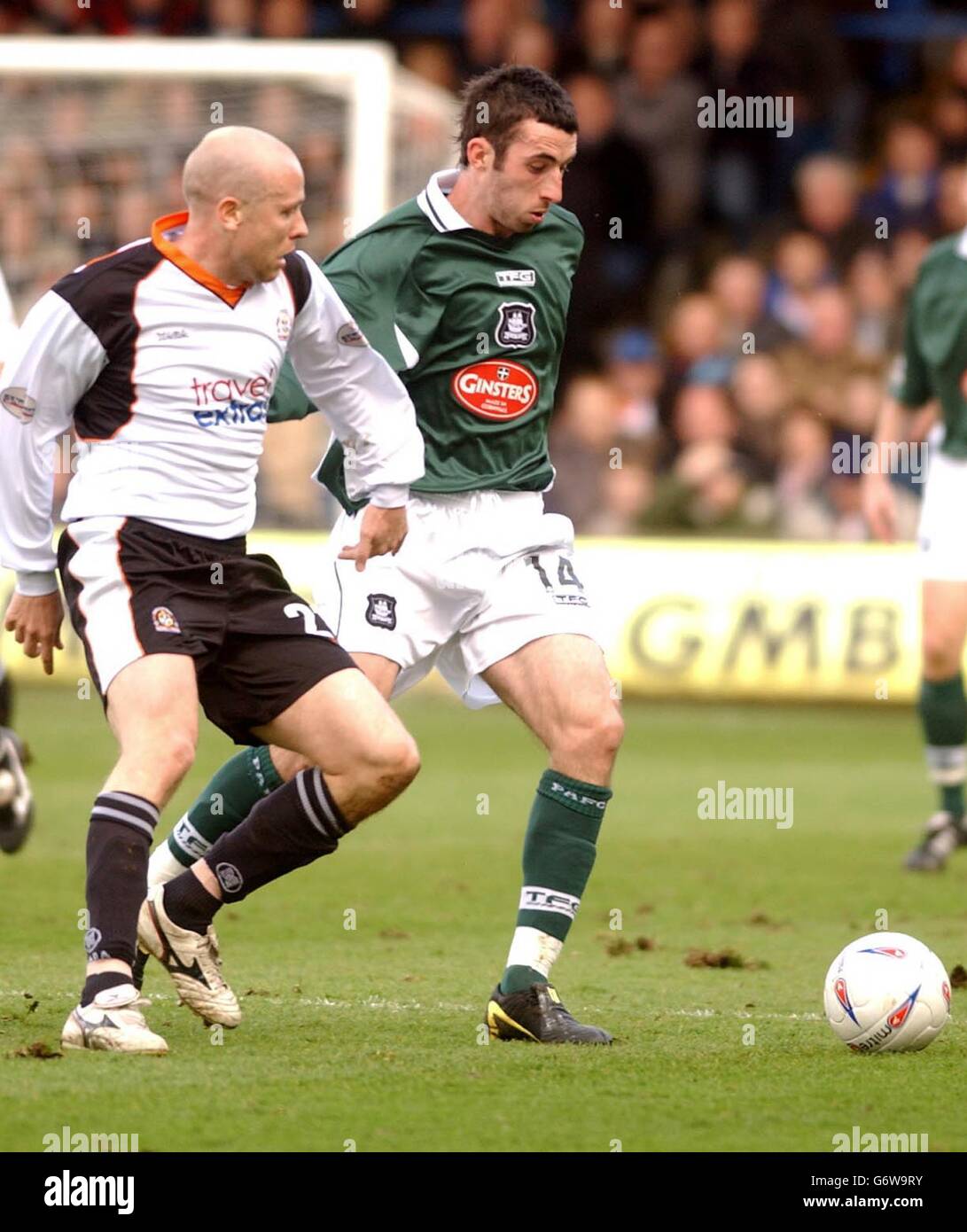 Luton's Paul Hughes (left) and Plymouth's Tony Capaldi during their ...
