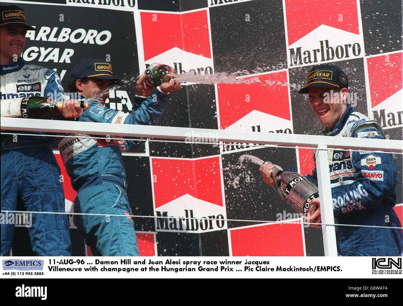 Motor Racing ... Hungarian Grand Prix. Damon Hill and Jean Alesi spray ...
