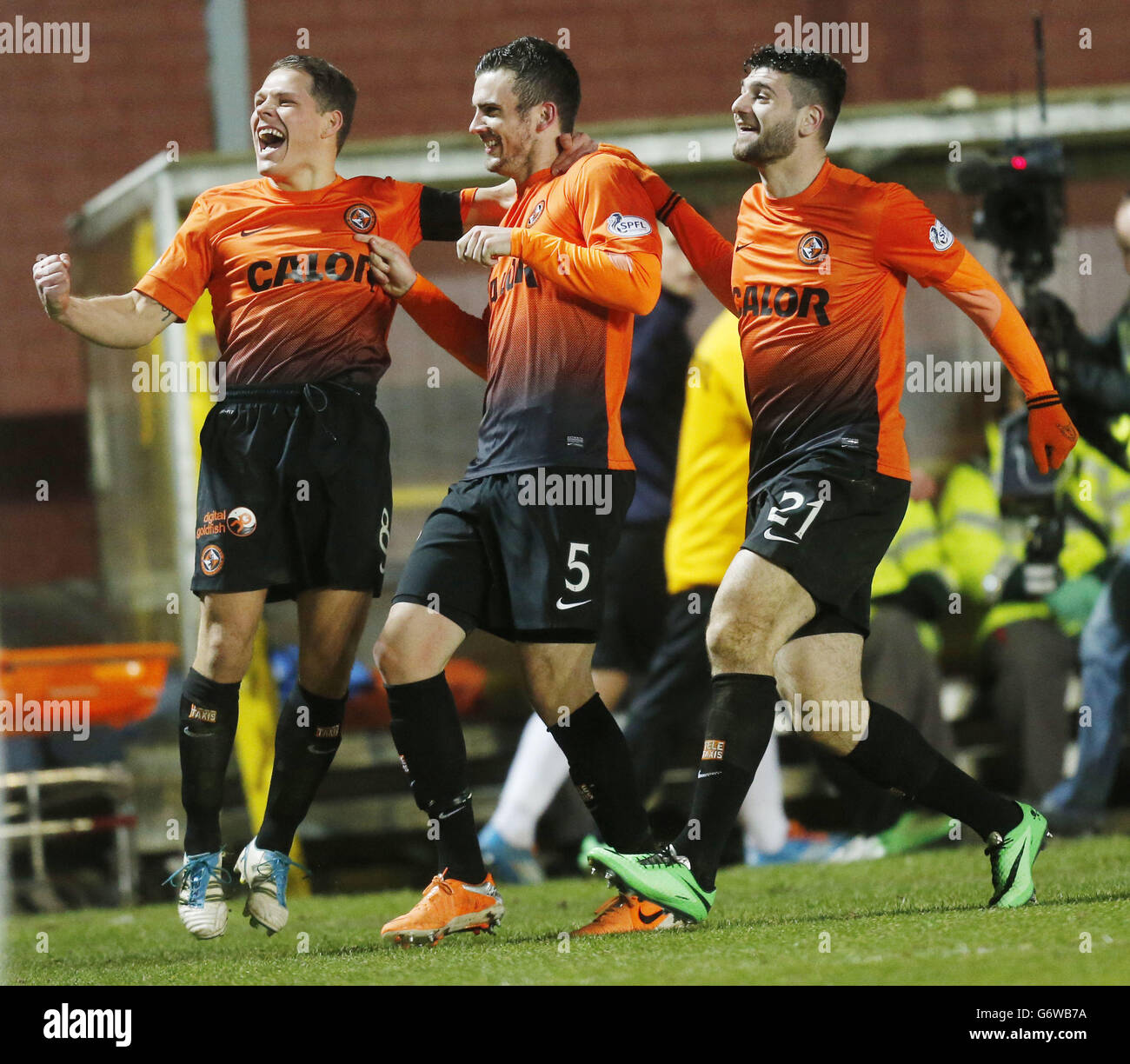 Dundee United's Gavin Gunning (centre) celebrates his 2nd goal with ...