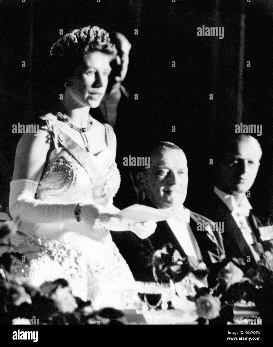 Queen Elizabeth II, speaking in French, responds to the toast made by ...