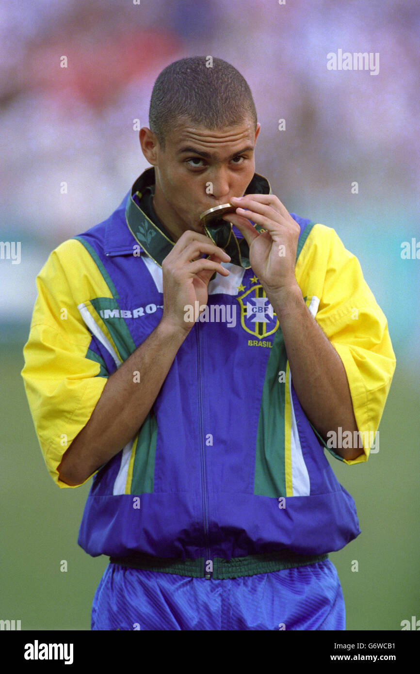 Soccer - Atlanta Olympics - Brazil v Portugal. Ronaldo kisses his ...