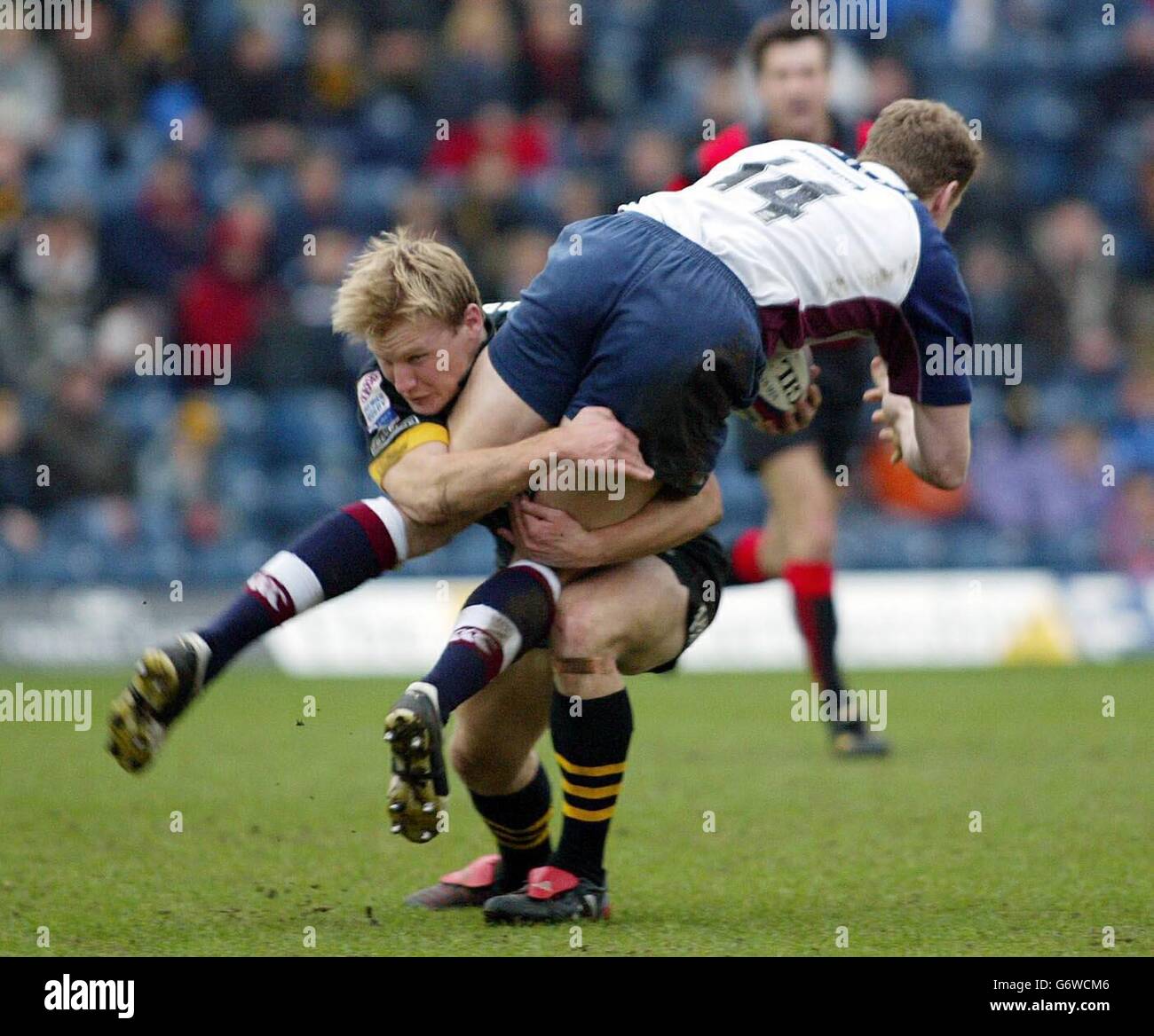 Wasps' Stuart Abbott challenges Rotherham's Anthony Elliott (right ...