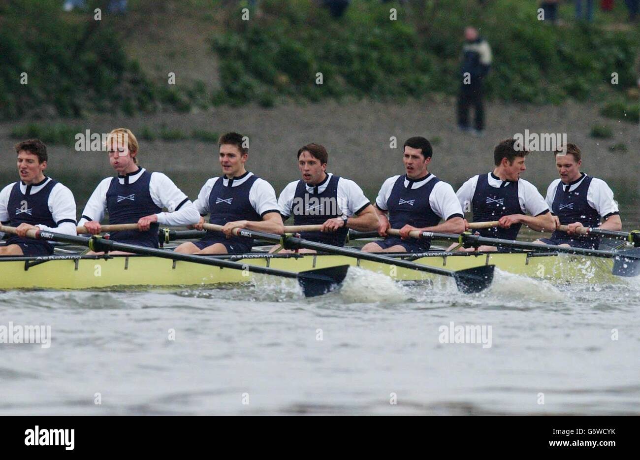 Oxford University's Basil Dixon (second right) turns to check on his ...