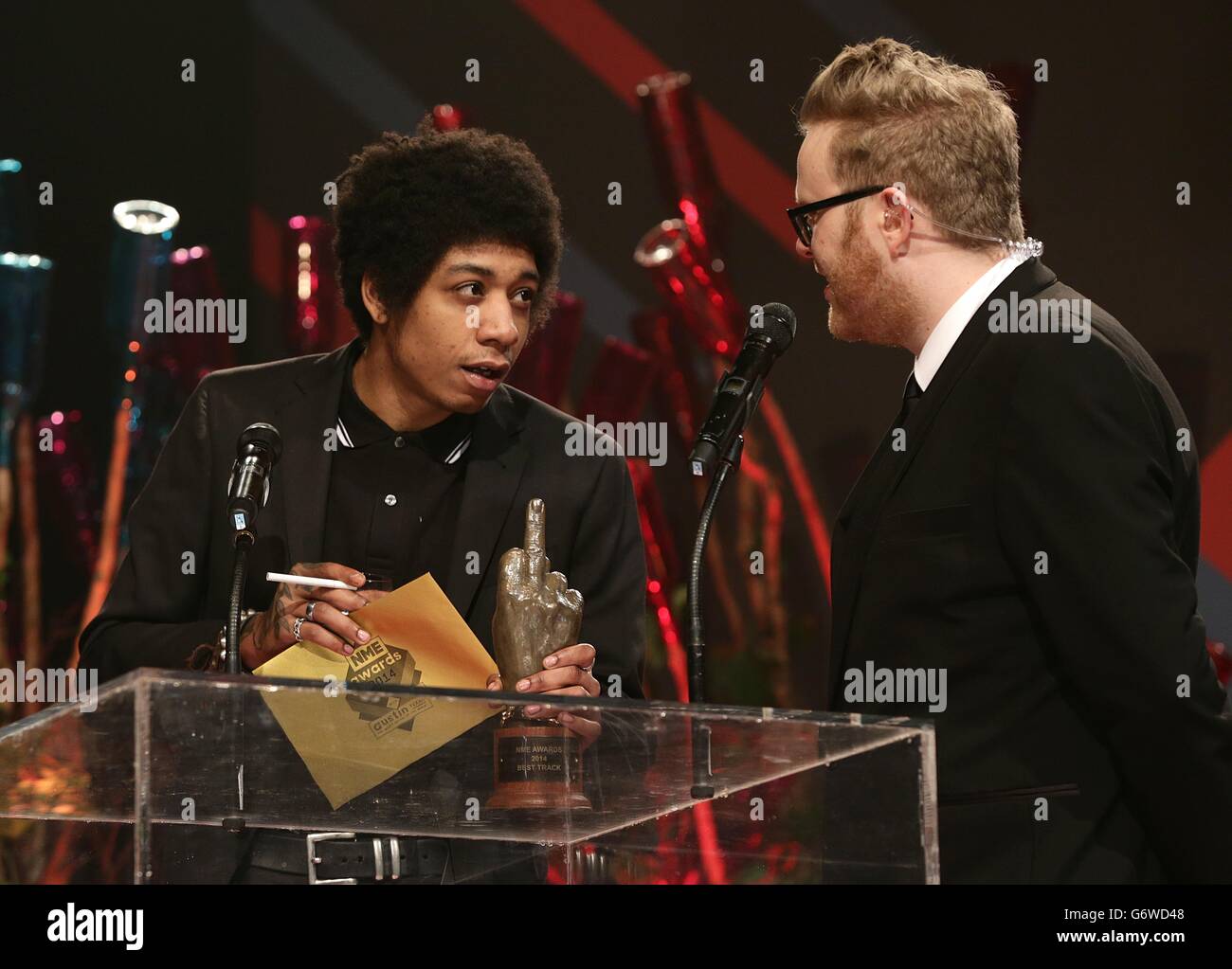 Honor titus huw edwards on stage during the 2014 nme hi-res stock ...