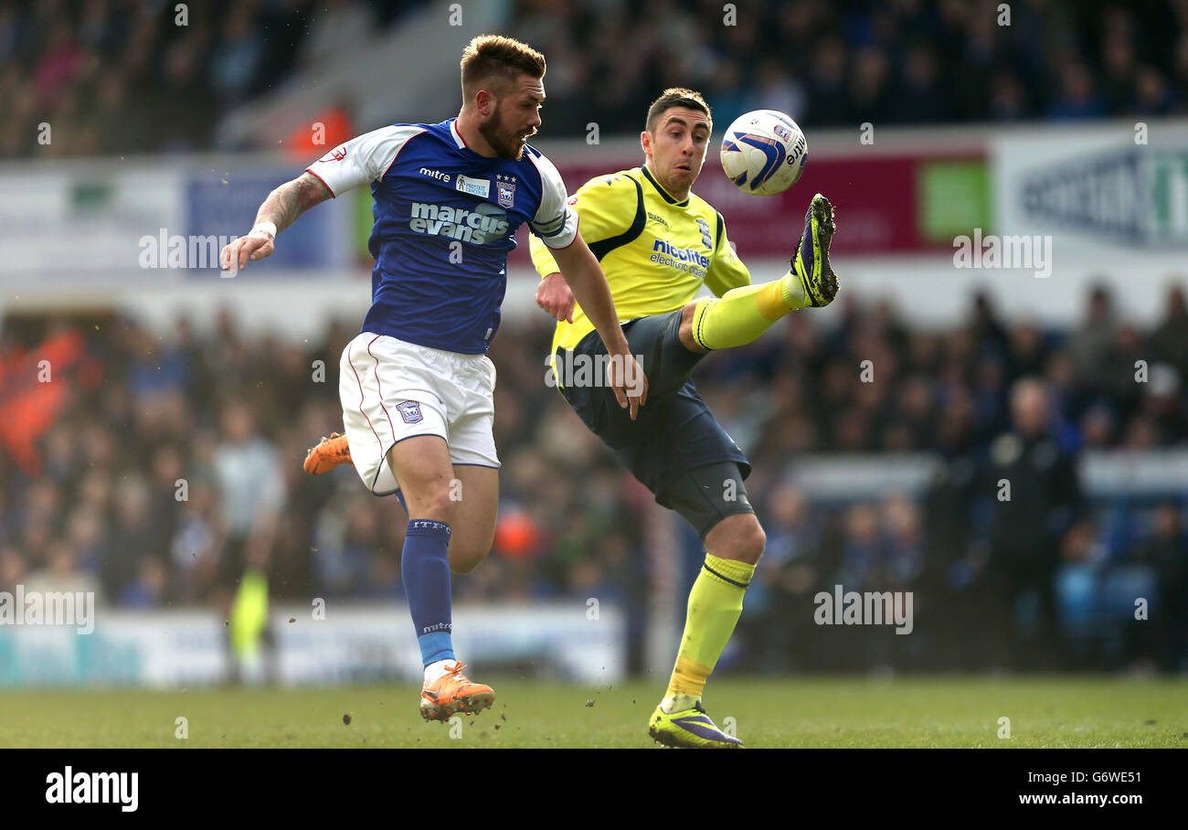 Ipswich Town's Luke Chambers and Birmingham City's Lee Novak compete ...