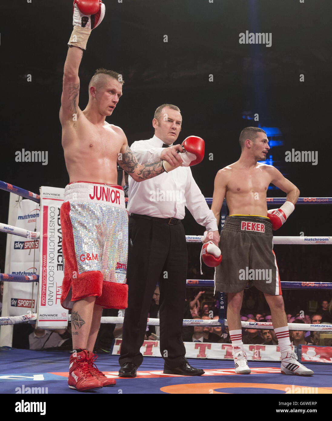 Michael Roberts (left) celebrates beating Romain Peker during their ...