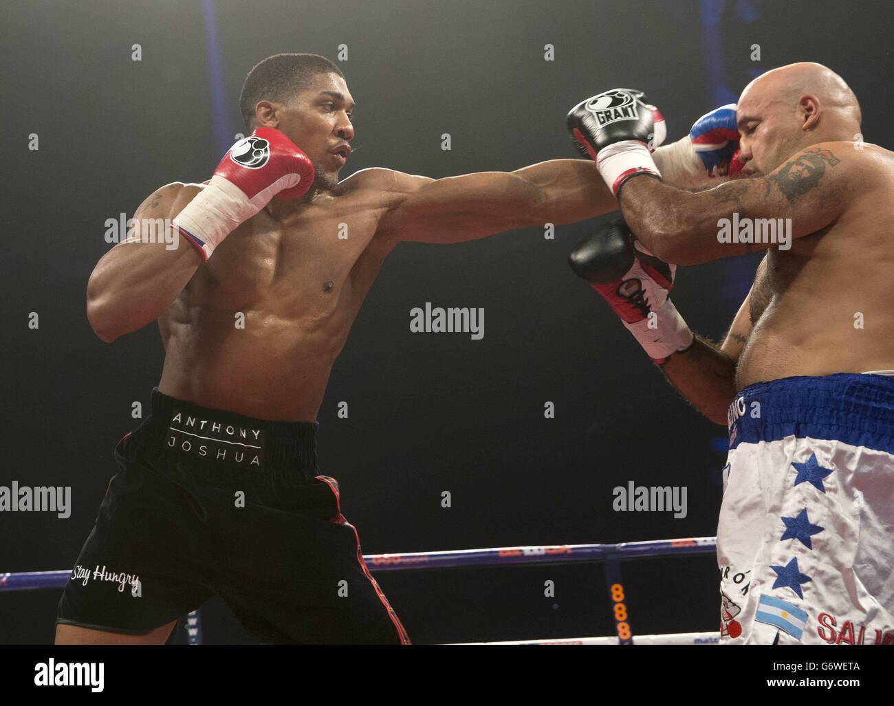 Action against ricky burns during hi-res stock photography and images ...