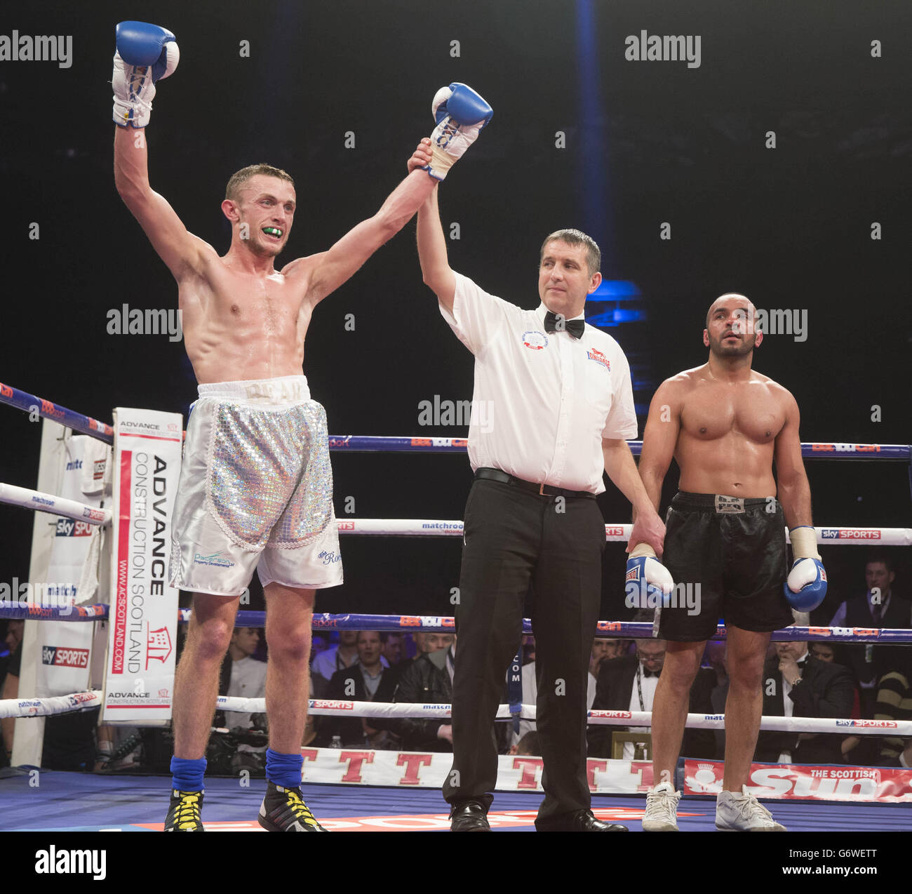 Ryan Smith (left) celebrates beating Ibrar Riyaz during their ...