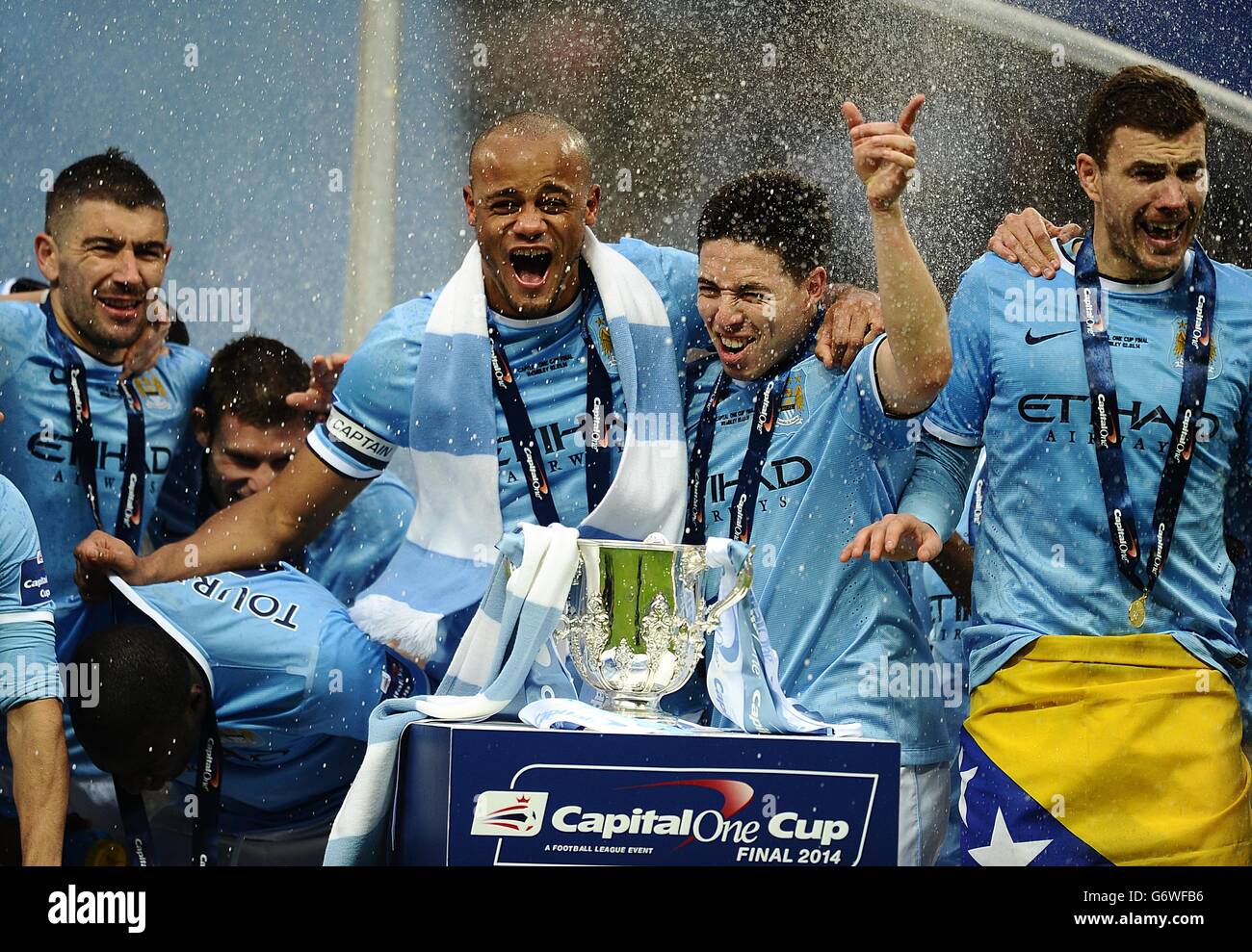 Manchester citys captain vincent kompany samir nasri with the trophy hi ...