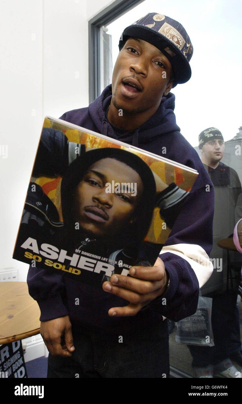 So Solid Crew member Asher D poses for photographers during a book ...