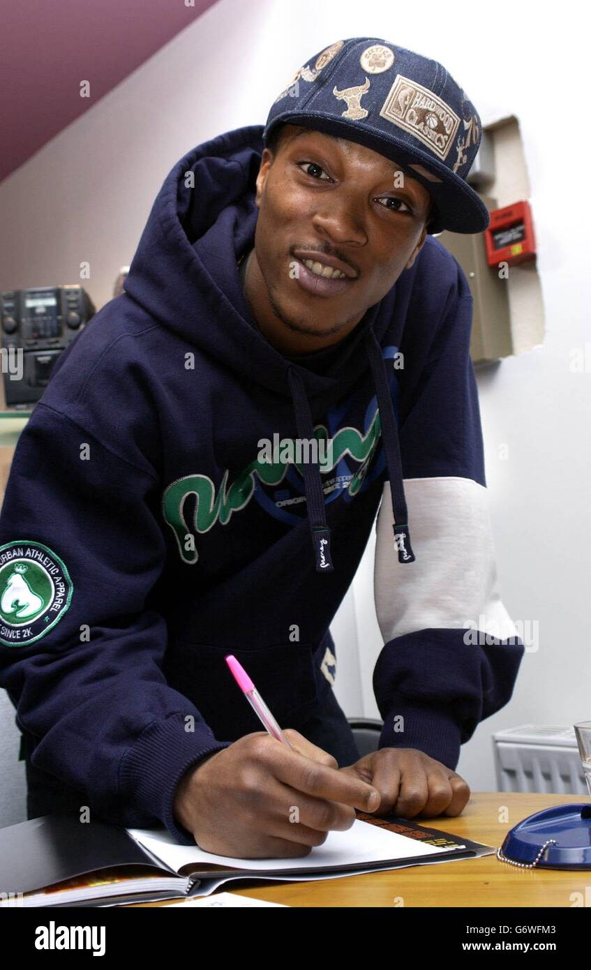 So Solid Crew member Asher D poses for photographers during a book ...