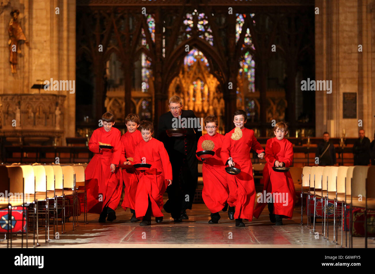 Choristers from Ely Cathedral choir and The Very Reverend Mark Bonney ...