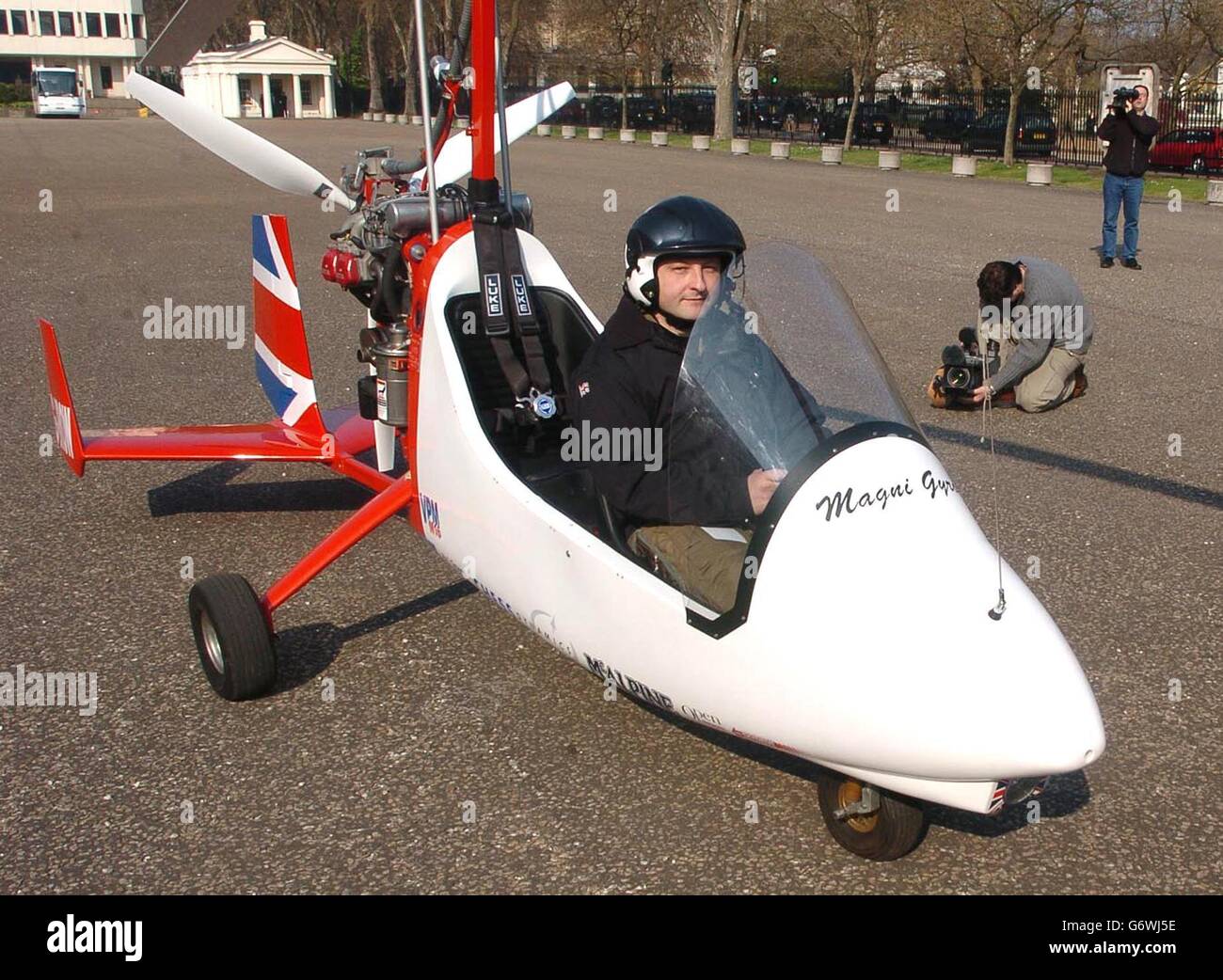Sits aboard his autogyro hi-res stock photography and images - Alamy