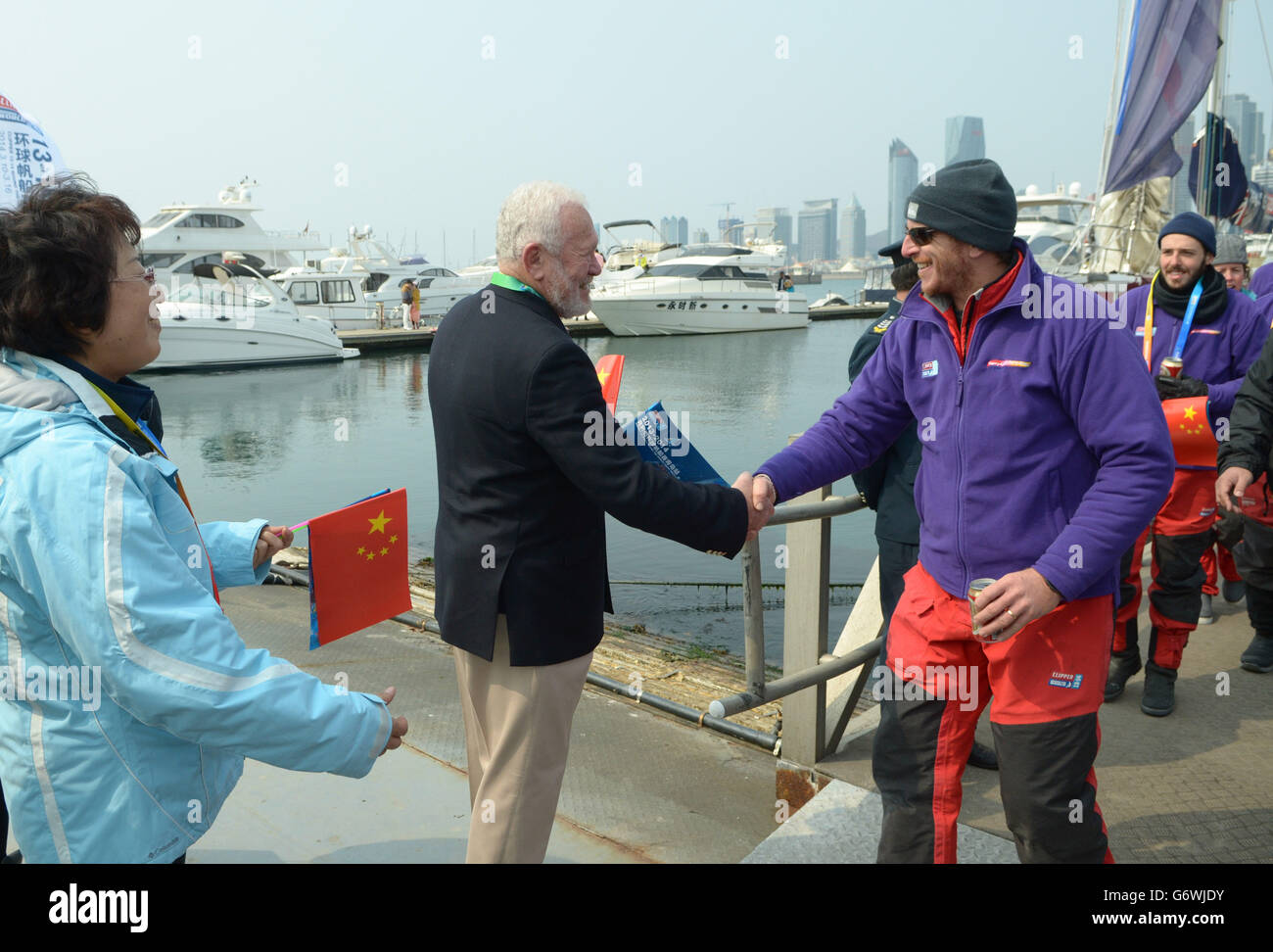 Sir Robin Knox-Johnston welcomes crew members of the ...