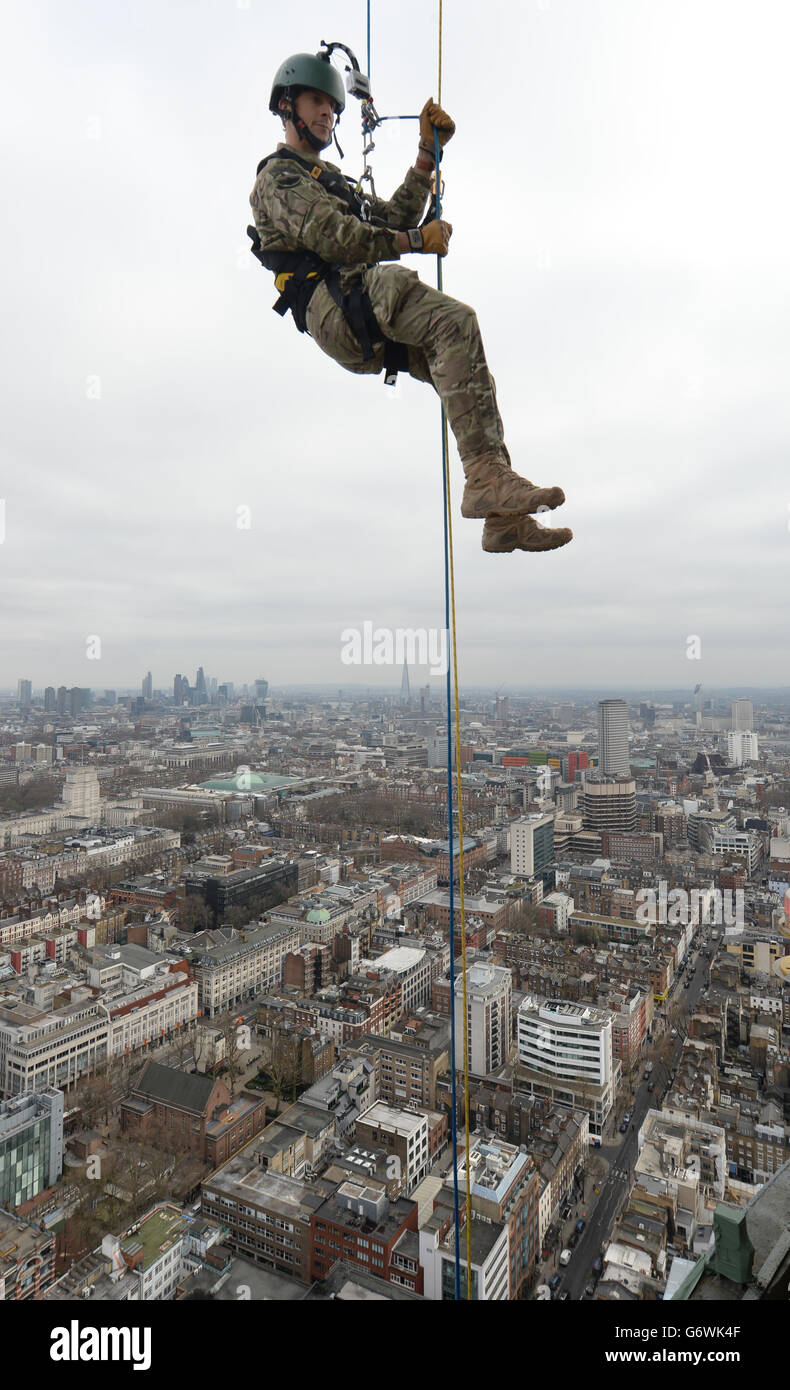 Charity abseil down the BT Tower Stock Photo - Alamy