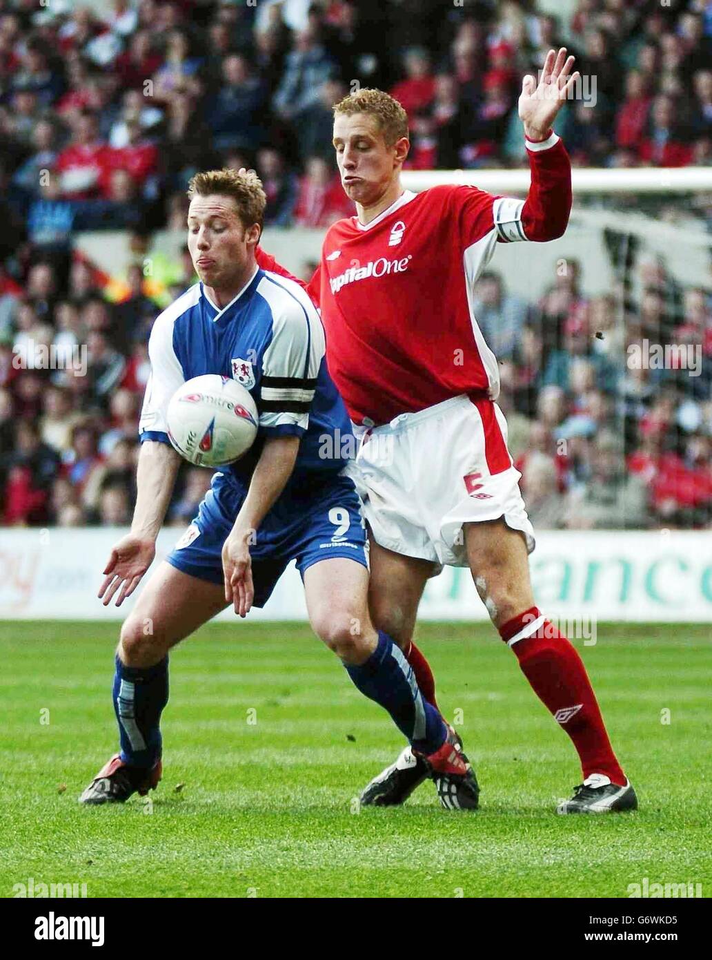 Sport football action neil harris michael dawson hi-res stock ...