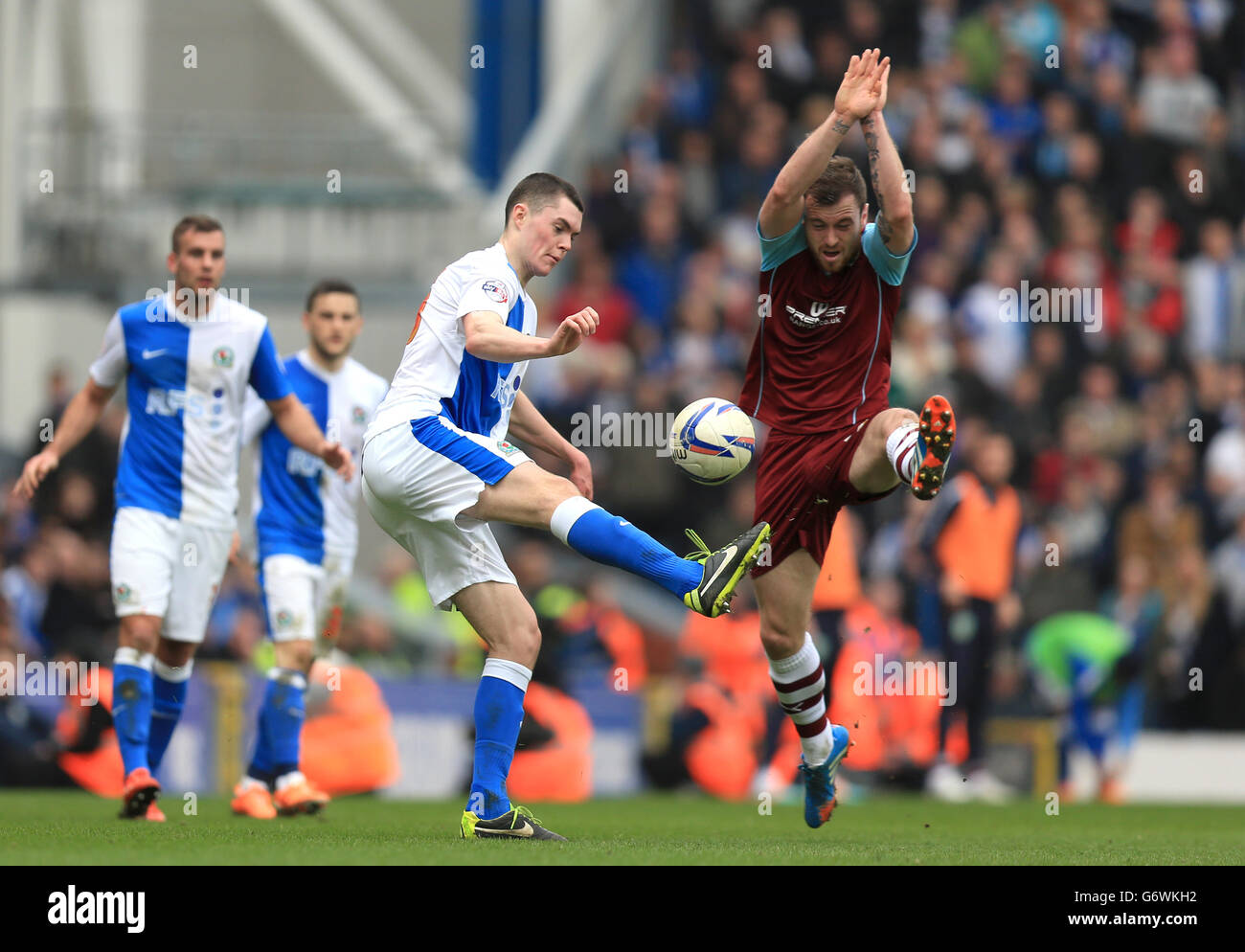 Blackburn Rovers' Michael Keane clears the danger from Burnley's Ashley ...