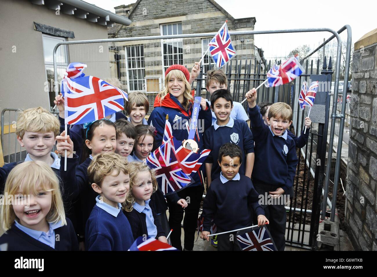 Olympic bronze medal winner Jenny Jones greets children from her former school, Hambrook Primary ...