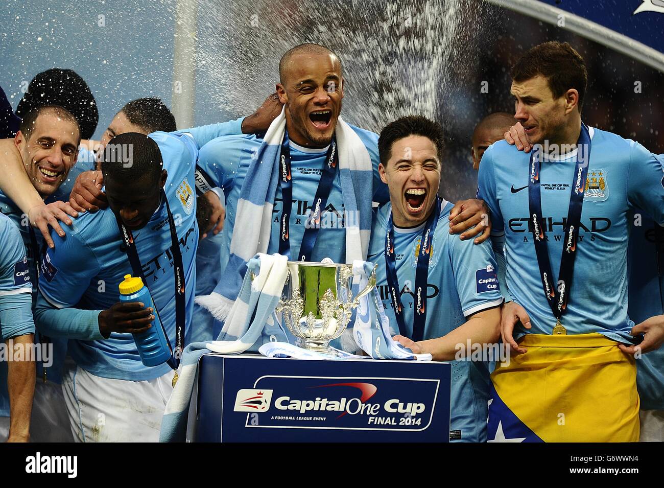 Manchester citys captain vincent kompany samir nasri with the trophy hi ...