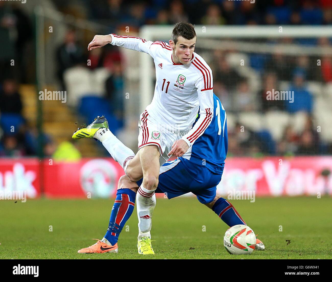 Wales' Gareth Bale (left) and Iceland's Aron Gunnarsson battle for the ...