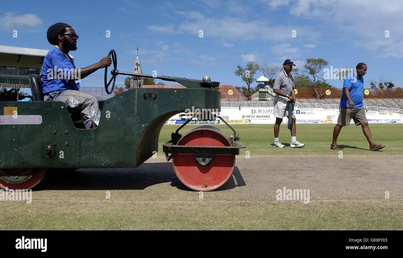 Former West Indian pace bowler Andy Roberts (left) talks to England ...